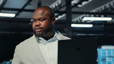 Data Center System Administrator Coding On Laptop Doing Software Updates Stock Footage Video