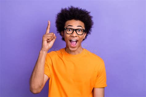 Photo Of Impressed Cheerful Clever Person Point Finger Open Mouth Brilliant Idea Isolated On