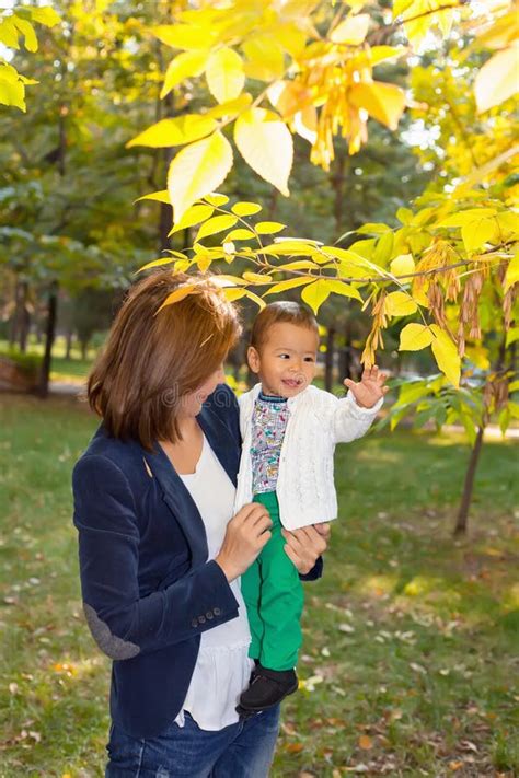 Asian Granny Playing With Her Grandson In The Park Stock Image Image
