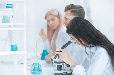 Female Scientist Uses A Microscope In The Laboratory Stock Image Image Of Analyzing