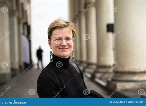Outdoor Portrait Of A Yo Short Haired White Woman Wearing A Black Jersey Stock Photo Image