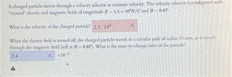 solved a charged particle moves through a velocity selector