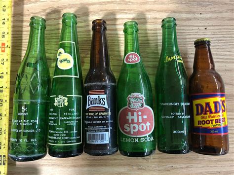 Assorted Pop Bottles And Fabric Bag