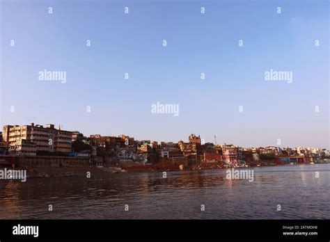 Long View Of Popular Assi Ghat With Several Pilgrims That Stands At