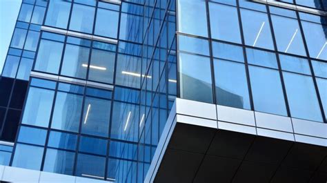 Premium Photo Abstract Reflection Of Modern City Glass Facades Modern