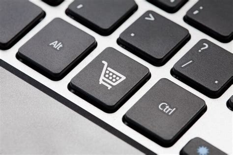 premium photo shopping button key on laptop keyboard