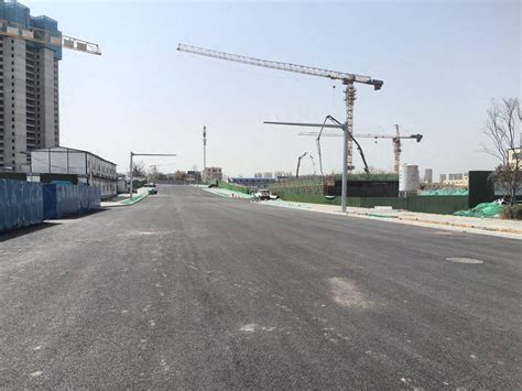 记者在现场｜桐柏路路面平坦 桐柏支路预计7月具备通车条件工程青岛道路
