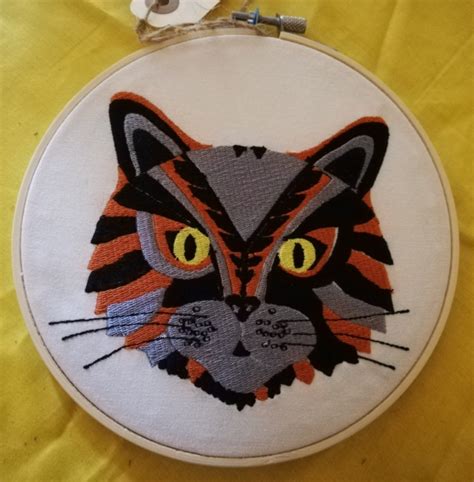 A Delightful Embroidery Hoop Artwork Featuring A Tabby Cat