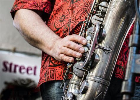 Premium Photo Midsection Of Man Playing Saxophone