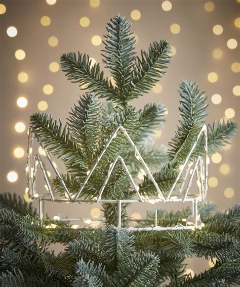 The Unusual Tree Topper Trend Youre About To See Everywhere Livingetc