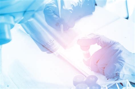 Premium Photo Cropped Hands Of Scientist Experimenting In Laboratory