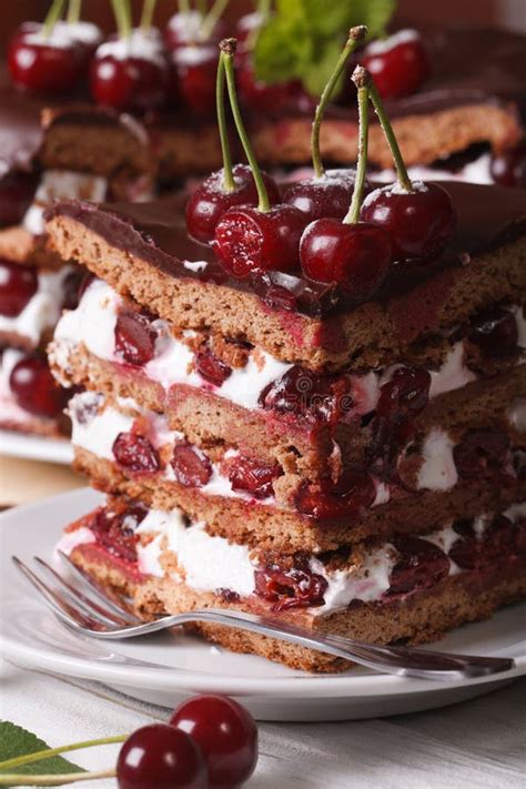 Delicious Slice Of Cherry Cake With Chocolate Close Up Vertical Stock