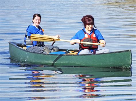 Girls In Kayaks On Irish Sea At Cushendun Co Antrim Northern Ir