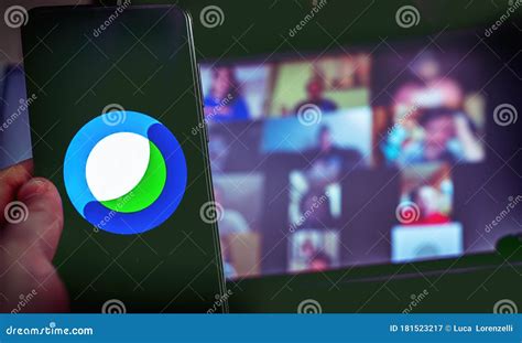 Hand Use Videoconference App Icon Of Cisco Webex On Smartphone