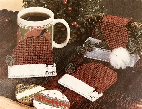 Santa Hat Plastic Canvas Coaster Set Etsy Plastic Canvas Coasters