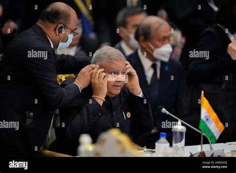 Indias Vice President Jagdeep Dhankhar Adjusts His Earphone During