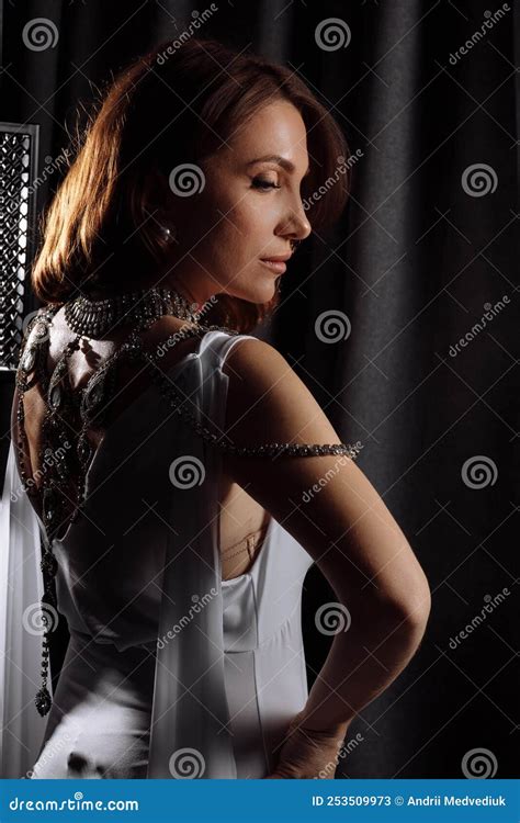 Beauty Concept Portrait Of A Beautiful Young Showy Brunette Woman With