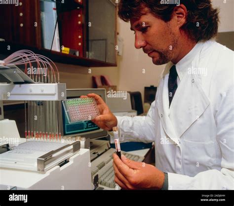 Scientist Using A Computer In Testing Blood Group Type A Means Of