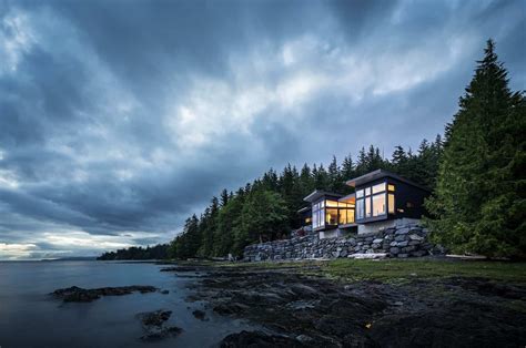 Modern Retreat For A Nature Lover Perched Over A Serene Alaska Shoreline