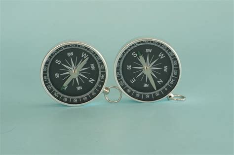 Premium Photo Compass Isolated On Blue Background