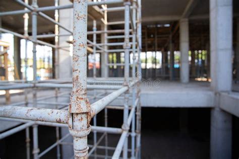 Scaffolding Assembly Erected In The Opening Of A Reinforced Concrete
