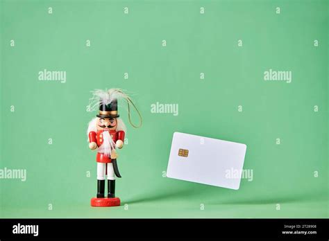 Traditional Colorful Wooden Christmas Nutcracker In Red Suit With A