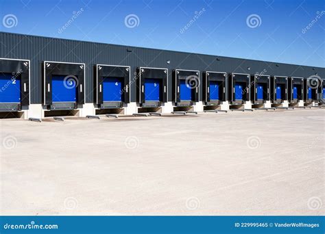 row of loading docks with shutter doors at an industrial warehouse