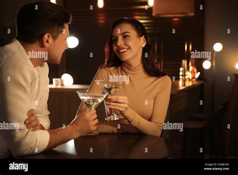 Man And Woman Flirting With Each Other In Bar Stock Photo Alamy