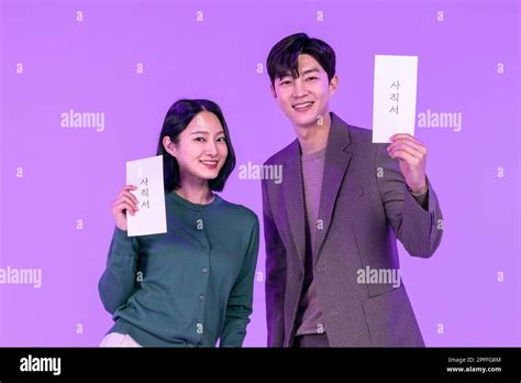 Business Working Concept Young Korean Asian Woman And Man Holding A