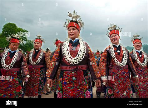 The Miao Women And Girls Dressing Their Traditional Costumes Dance In