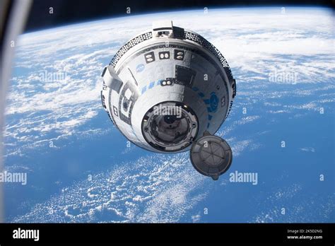 Boeing's CST-100 Starliner crew ship approaches the International Space Station on the company's ...