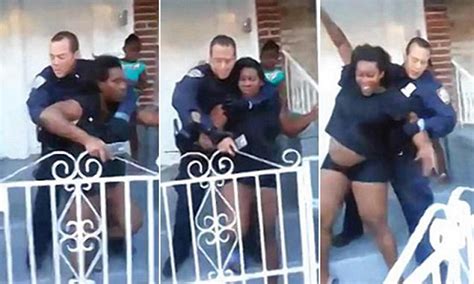 Nypd Officer Pictured Putting Seven Months Pregnant Woman Into A