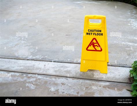 Yellow Caution Slippery Wet Floor Sign With Slippery Person Warning