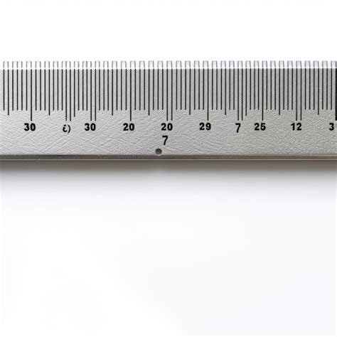 Premium Photo Shiny Bumpy Texture Ruler On White Background