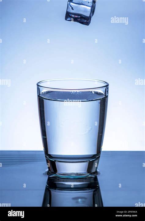 The Image Of Pouring Drinking Water Into A Glass That Makes One Feel