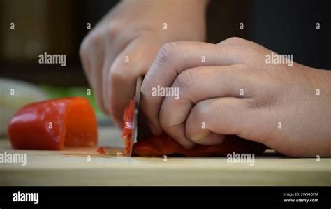 Chef Skillfully Cuts Chops And Slices A Vibrant Array Of Fresh