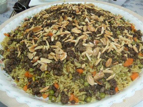 Chicken Ouzi Recipe Rice With Carrots And Peas From Palestine We Make