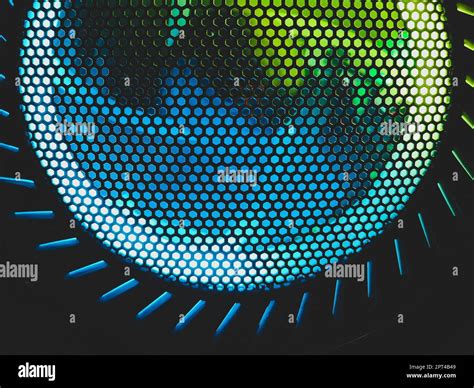Colorful Led Lights Of Computer Fan Shines Through The Protective Grid