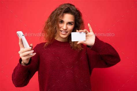 Young Smiling Beautiful Curly Brunette Woman With Sincere Emotions