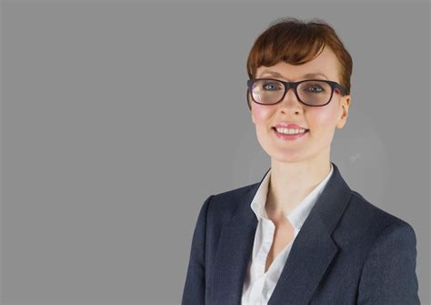 Premium Photo Portrait Of Businesswoman Wearing Glasses With Grey