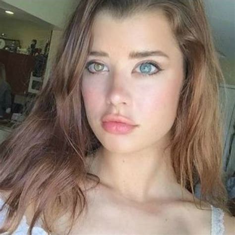 16 Incredibly Striking People Born With Different Colored Eyes Woman