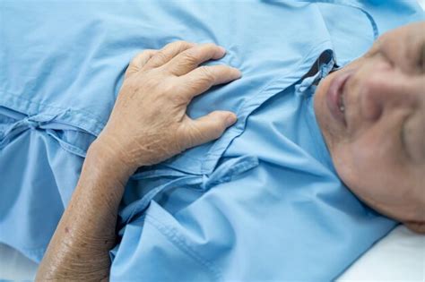 Premium Photo High Angle View Of Man Lying On Bed