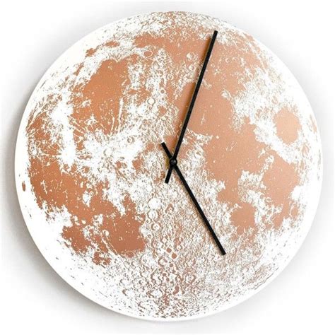 A Clock That Is Made To Look Like The Moon