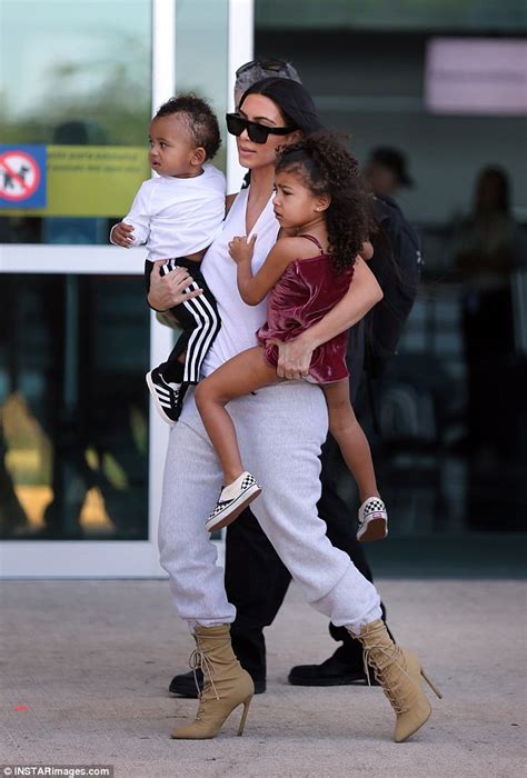 Kylie Jenner Holds Tygas Son As They Depart Costa Rica Daily Mail Online
