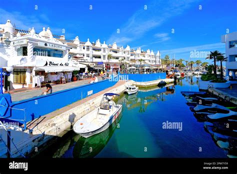 Malaga Benalmadena Marina Showing White Buildings With Yachts Boats And