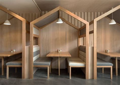 Booths With Pitched Roofs Added To Restaurant Kitty Burns Cafe Design