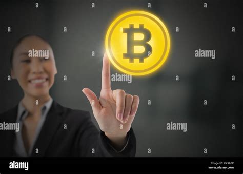 Digital Composite Of Businesswoman Touching Bitcoin Graphic Icon Stock