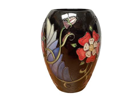 lot 1195 moorcroft pottery m c c vase with floral