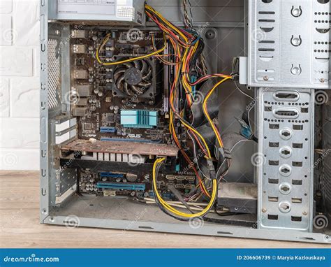 Inside Of Open Old Dusty Pc System Unit Before Cleaning On A Desk