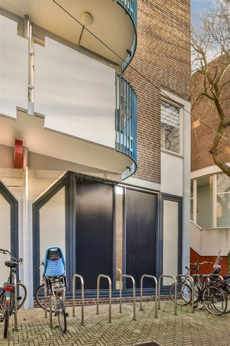 A Group of Bikes Parked in Front of a Building Stock Image - Image of ...